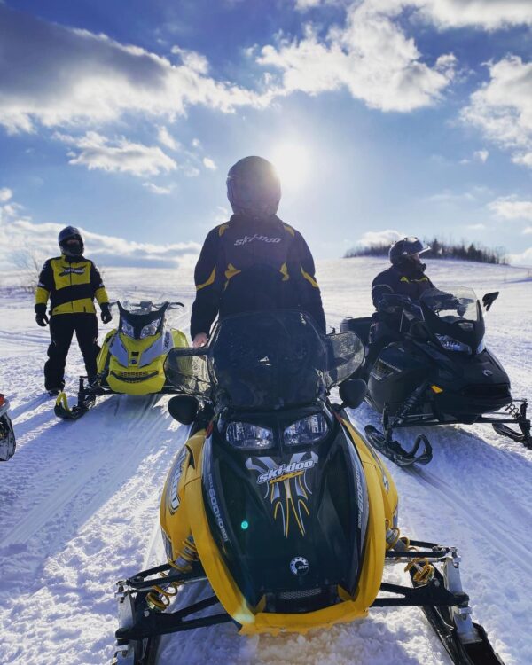 Your Guide To Snowmobiling In Maine This Winter