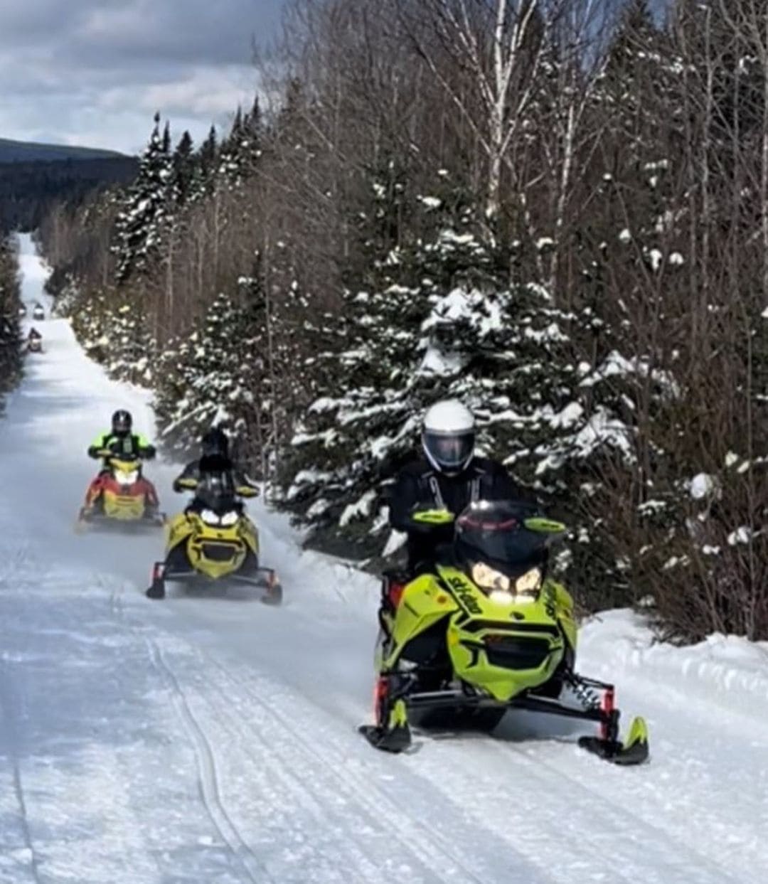 Your Guide To Snowmobiling In Maine This Winter